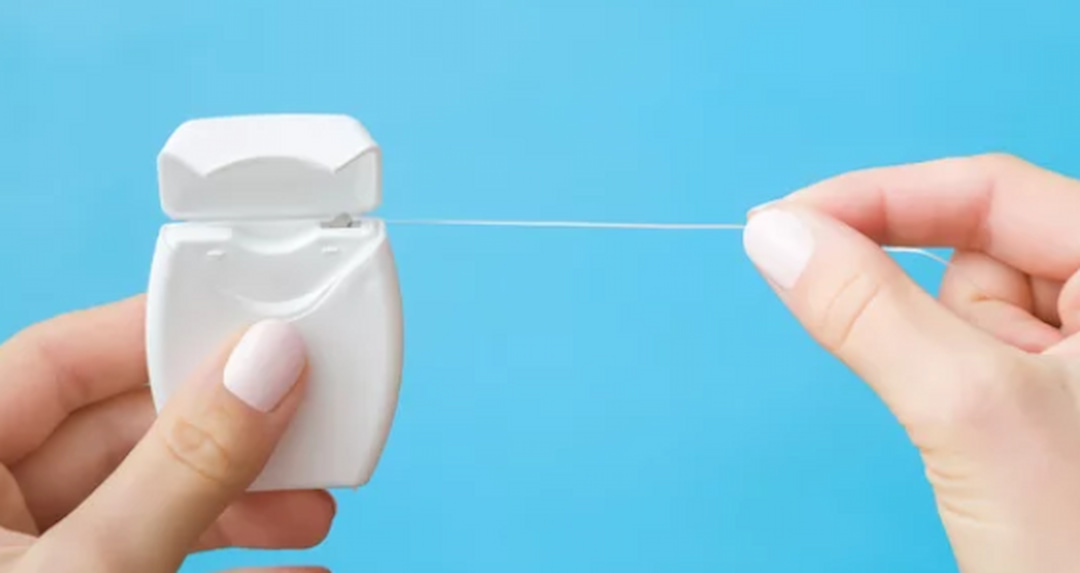 How to Floss with Braces - OC Dental Center